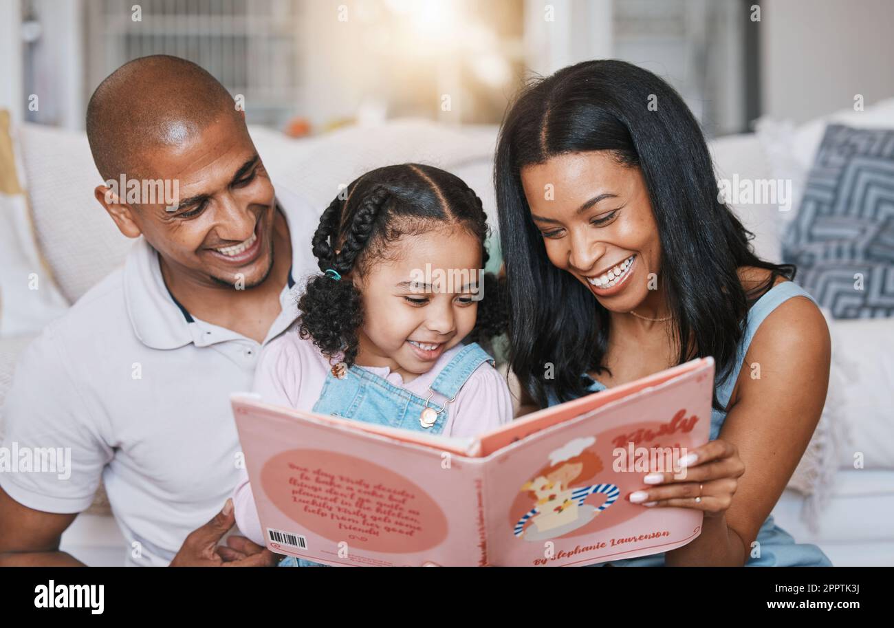 Family, smile and girl reading book in home, bonding and learning in ...