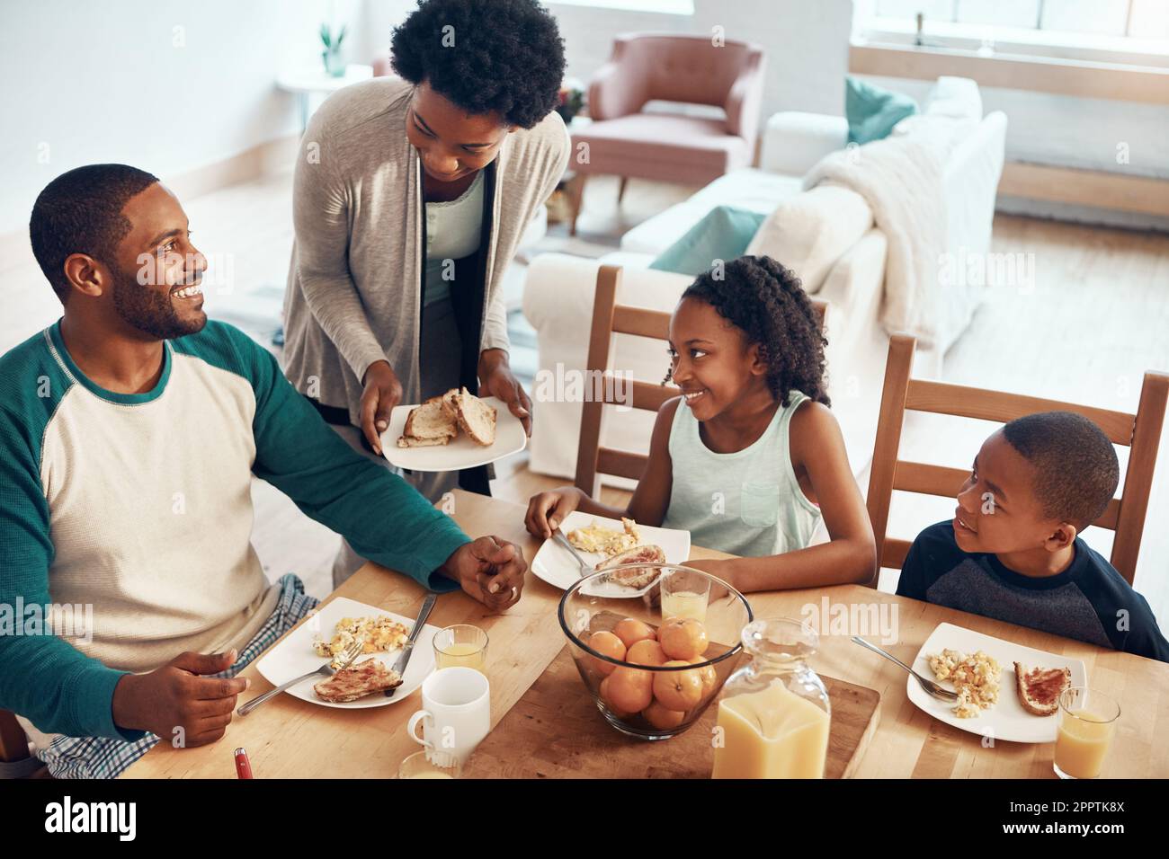 Our favourite time of the day. a family having breakfast together at ...