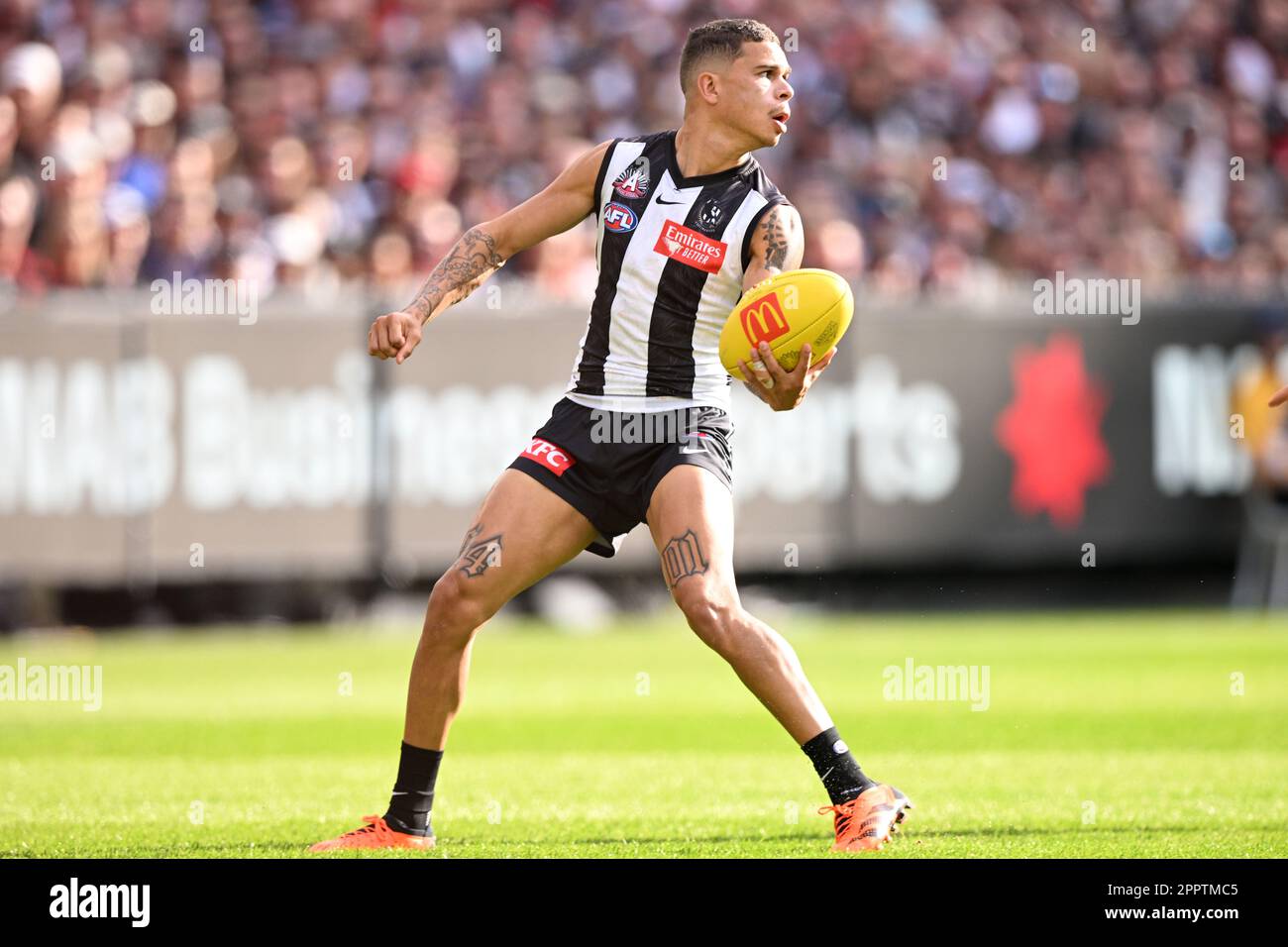 Bobby Hill of Collingwood handballs the footy during the AFL Round 6 ...
