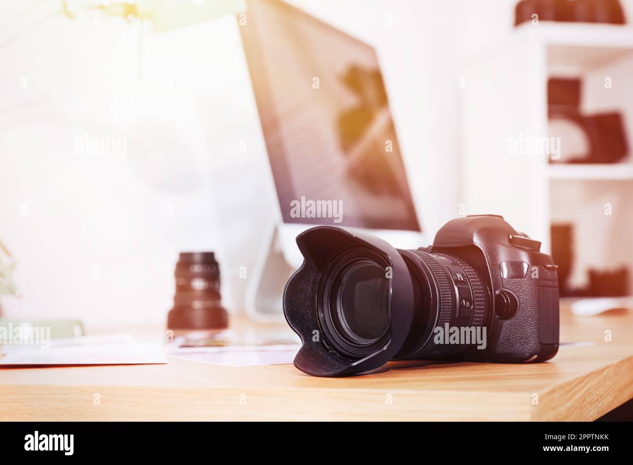 Photographer's workplace with professional camera in office Stock Photo ...