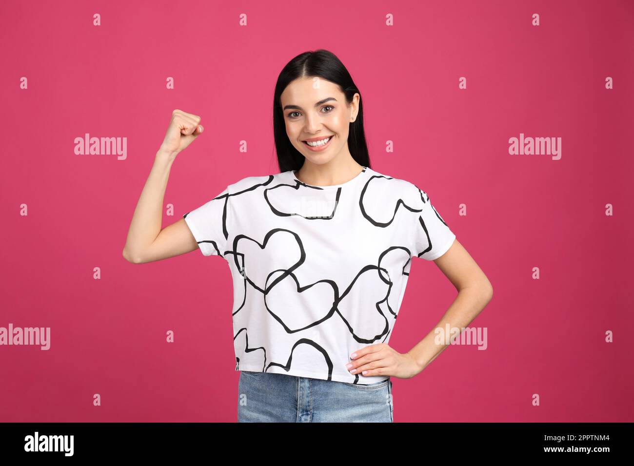 Strong woman as symbol of girl power on pink background. 8 March ...