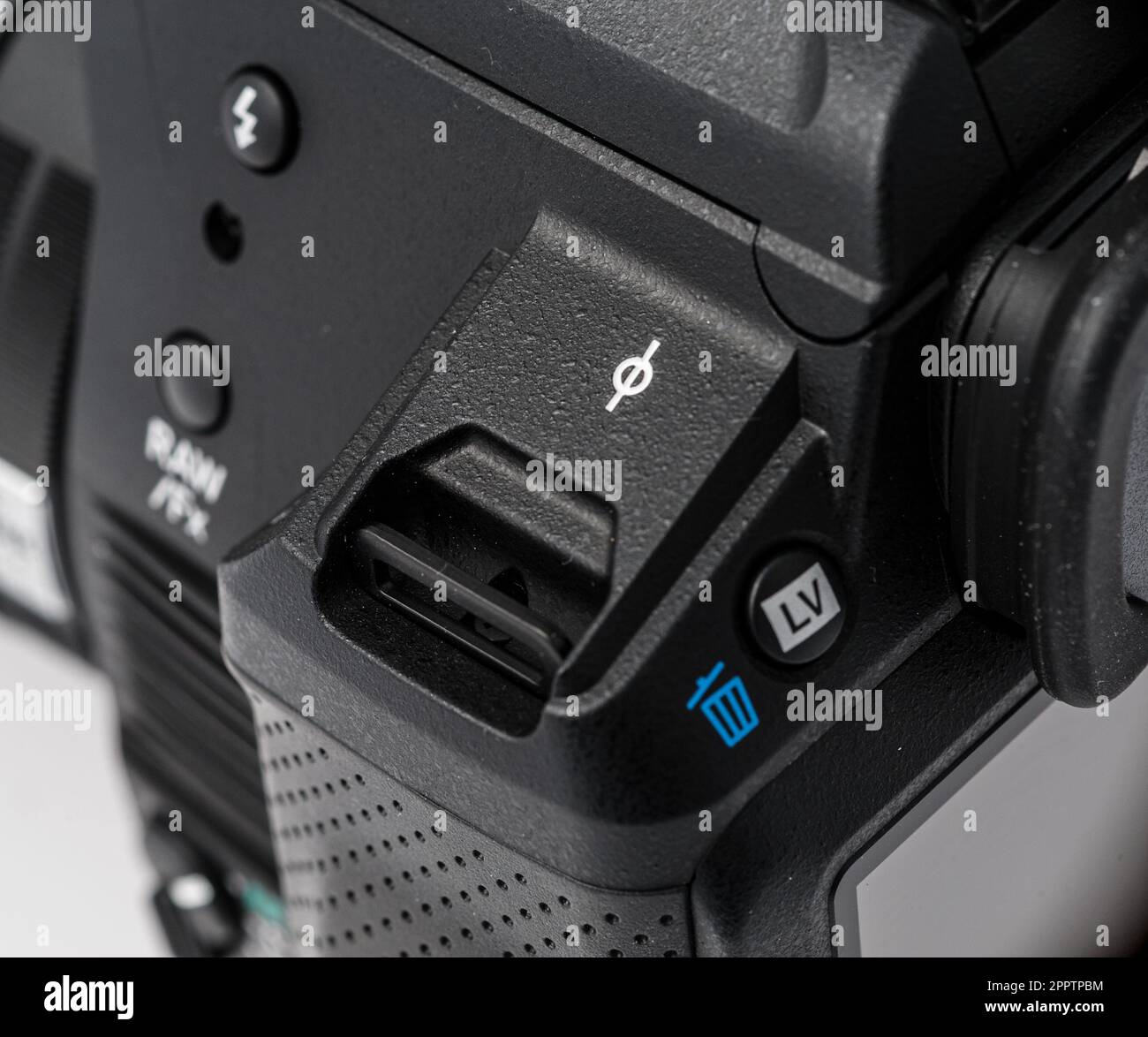 Detail of buttons and neck strap hook of a SLR camera Stock Photo - Alamy