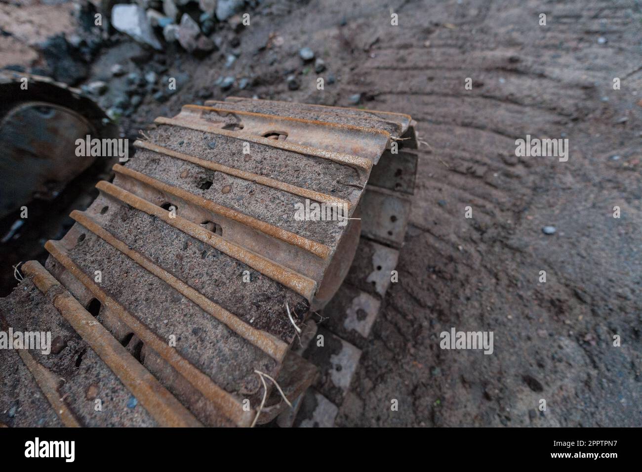 Metal belt of an excavator Stock Photo - Alamy