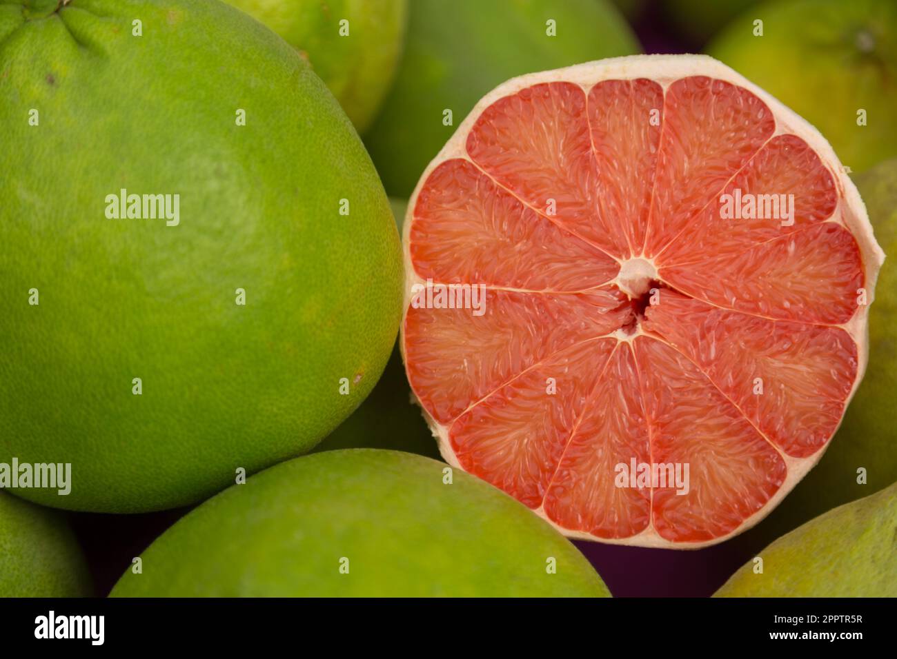 Green fresh red grapefruit slice organic nature background Stock Photo ...