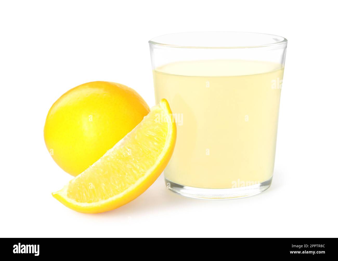Freshly squeezed juice and lemons on white background Stock Photo - Alamy