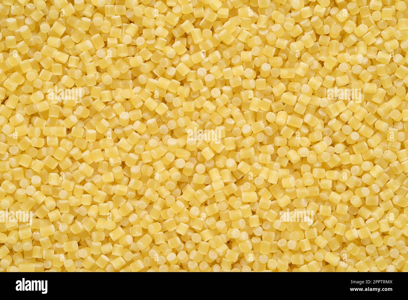 Small Piombino pasta for soup texture or background Stock Photo - Alamy