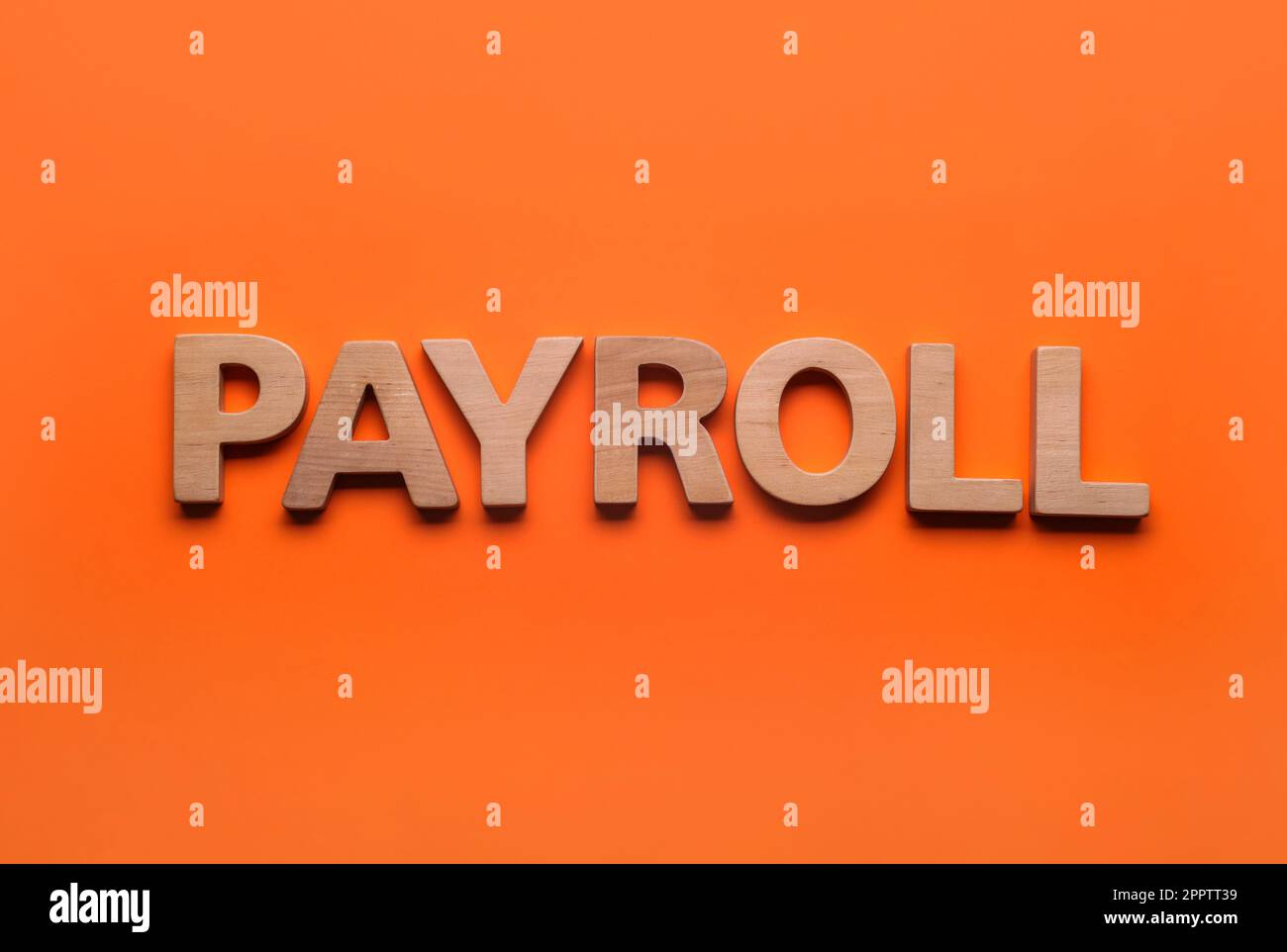 Word Payroll made of wooden letters on orange background, top view ...