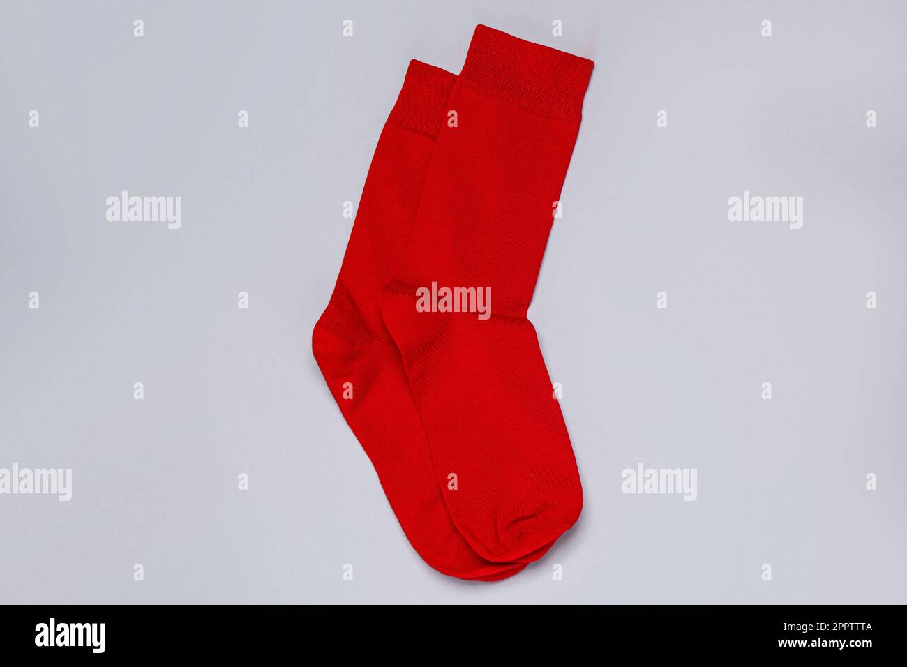 Pair of red socks on light grey background, flat lay Stock Photo - Alamy