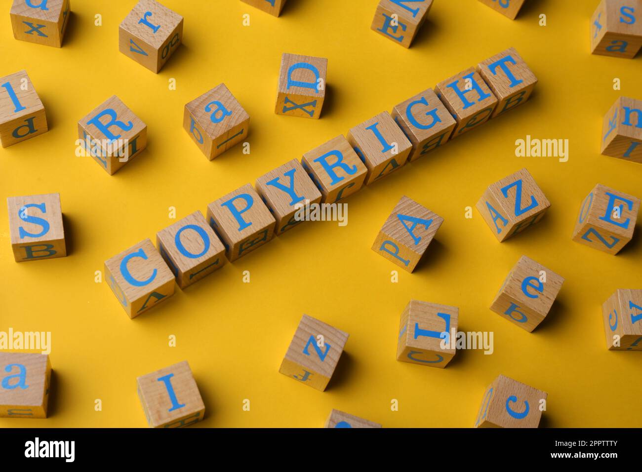 Plagiarism concept. Word Copyright made of wooden cubes with letters on ...
