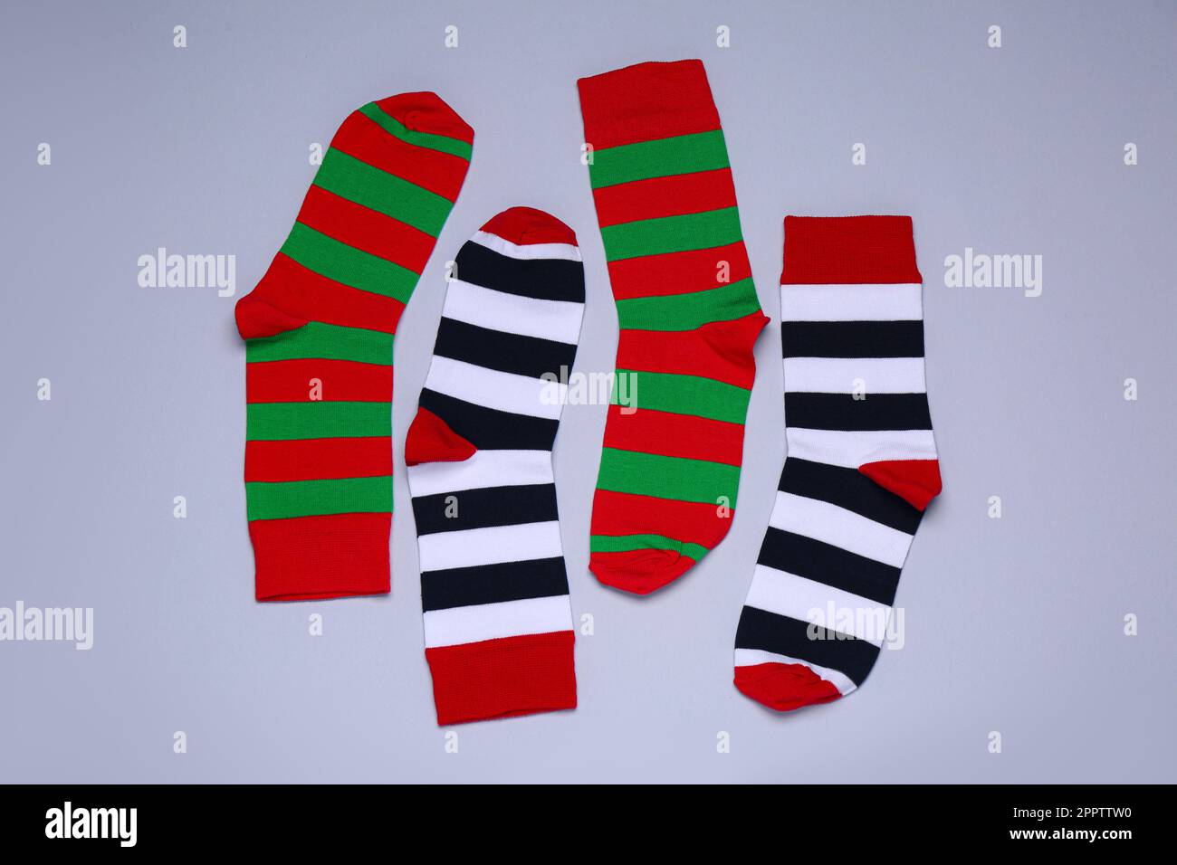 Different striped socks on grey background, flat lay Stock Photo - Alamy