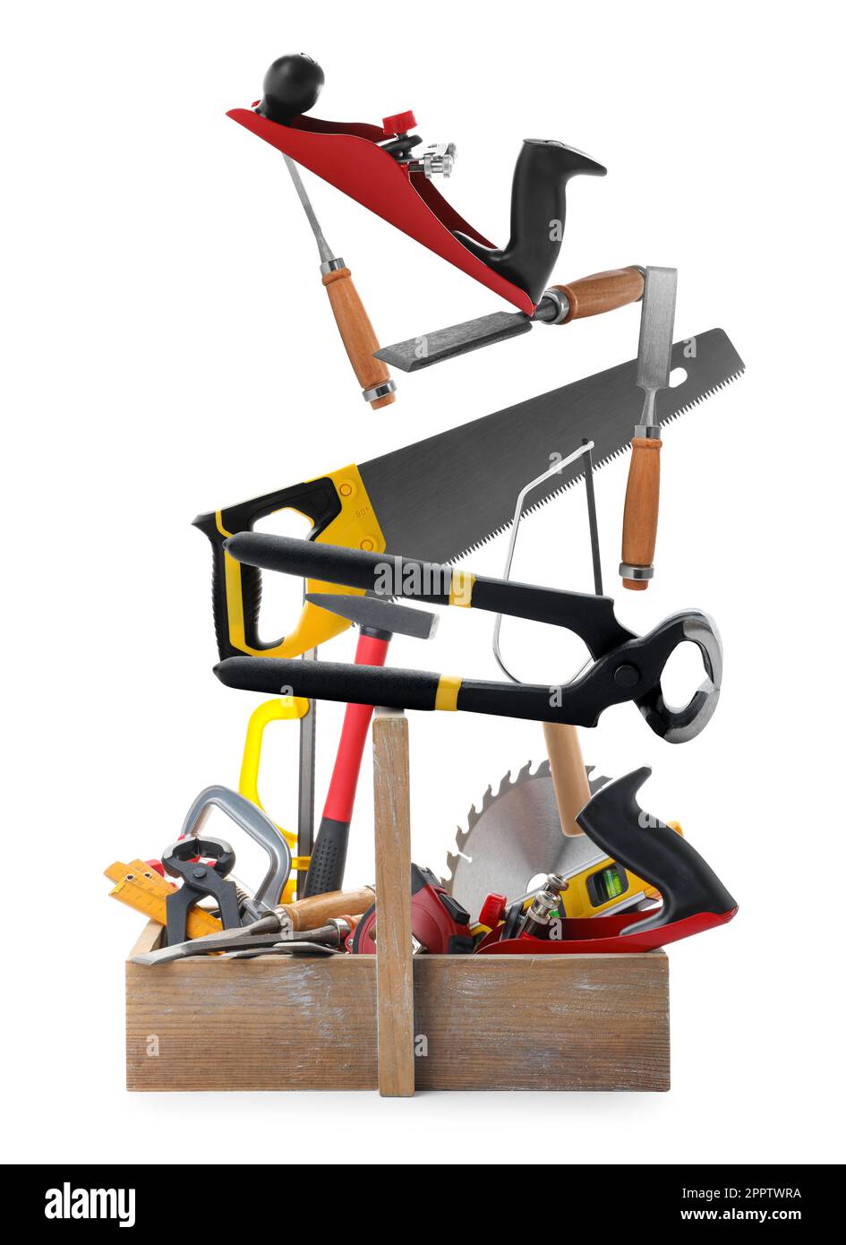 Different carpenter's tools falling into wooden box on white background ...