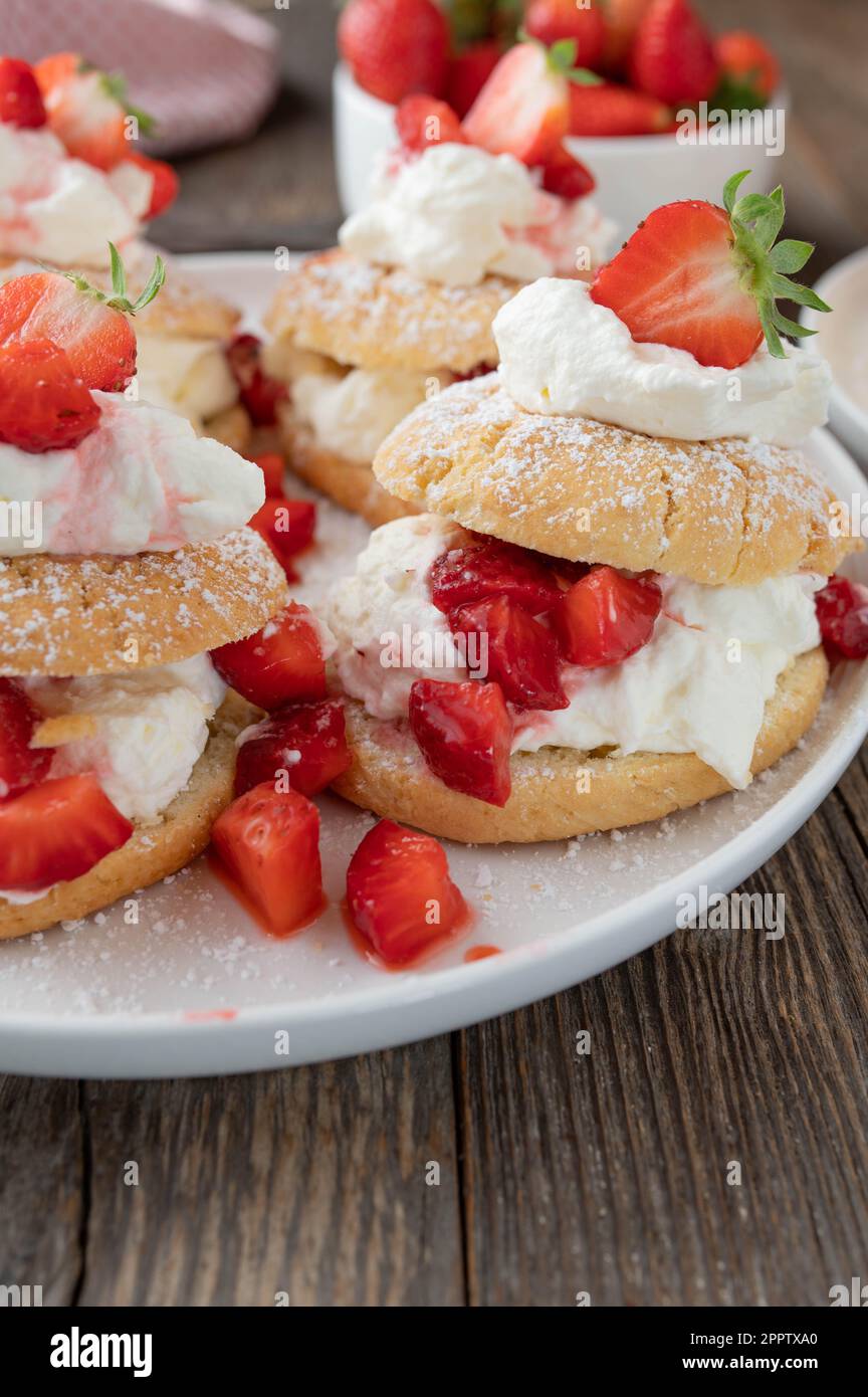 Summer strawberry cake or pastry with traditional shortcakes filled ...