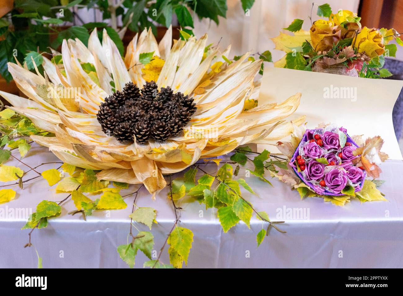 Decorative sunflower made by hand from corn cones and leaves Stock ...