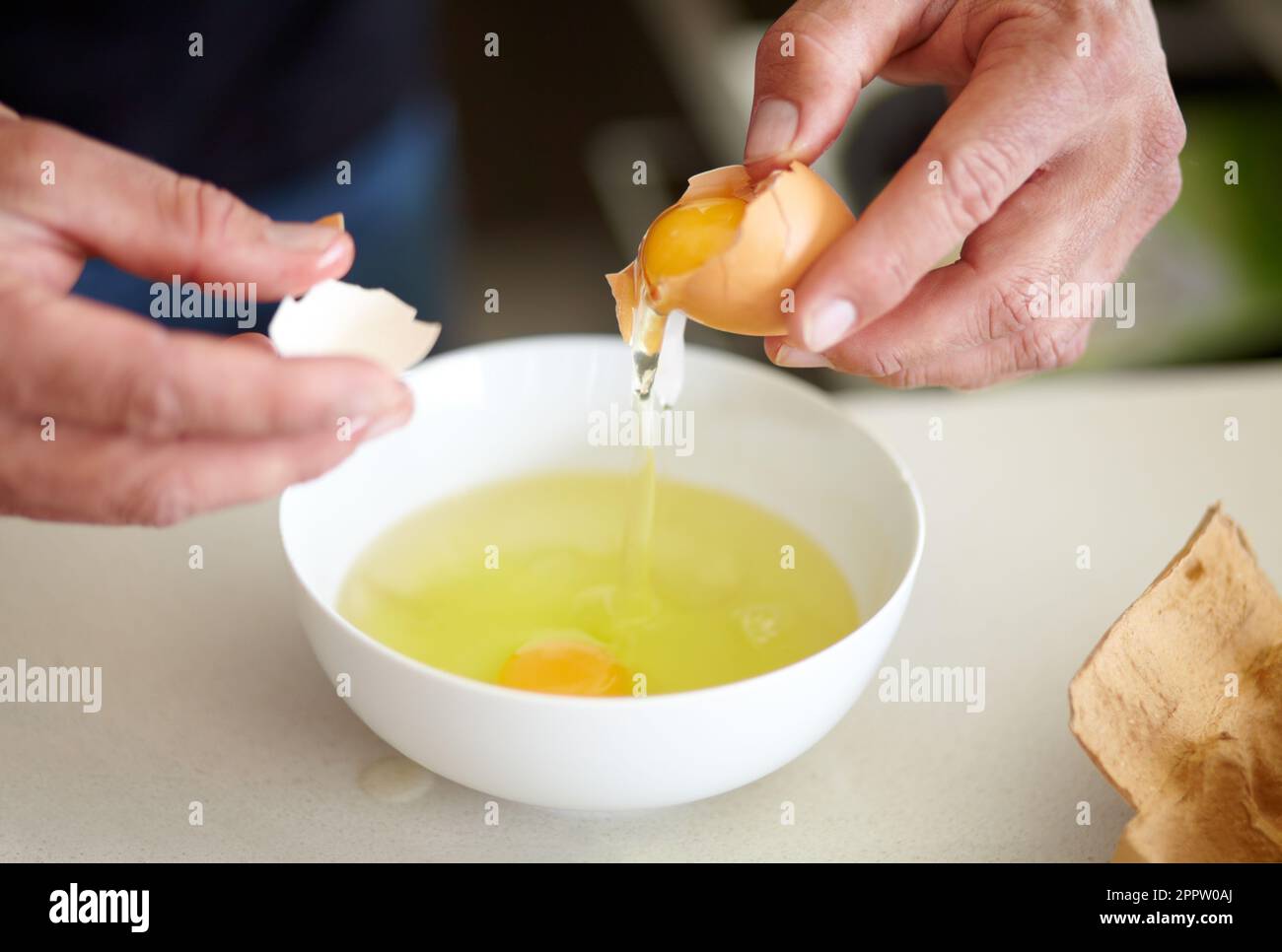 Egg, food and hands cooking breakfast in the kitchen for hunger ...