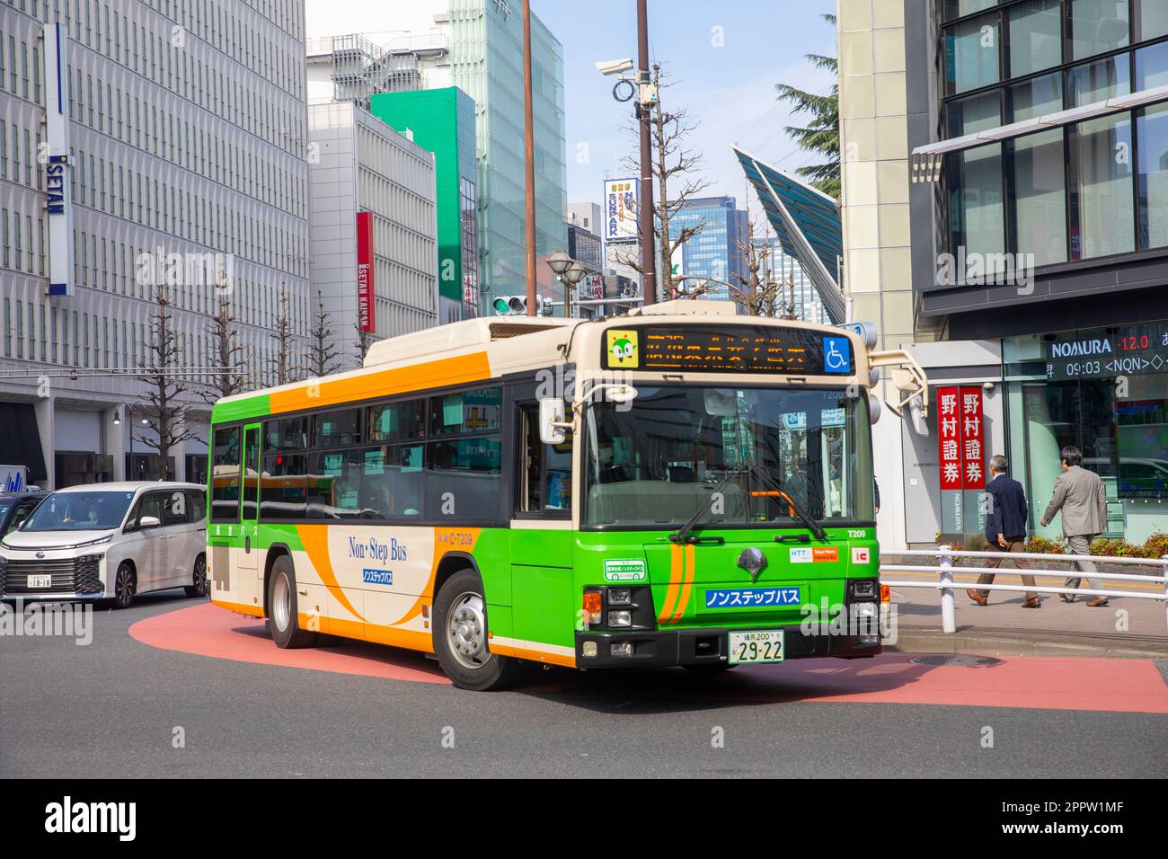 Tokyo Shinjuku April 2023, public single decker bus transport on the ...