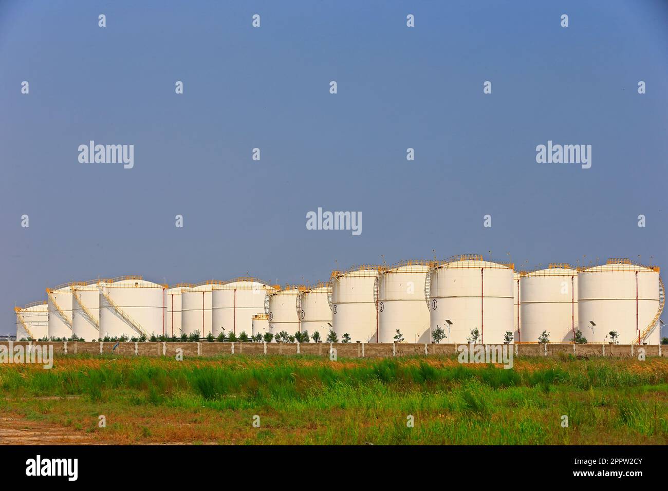 Oil storage tank, industrial equipment Stock Photo - Alamy