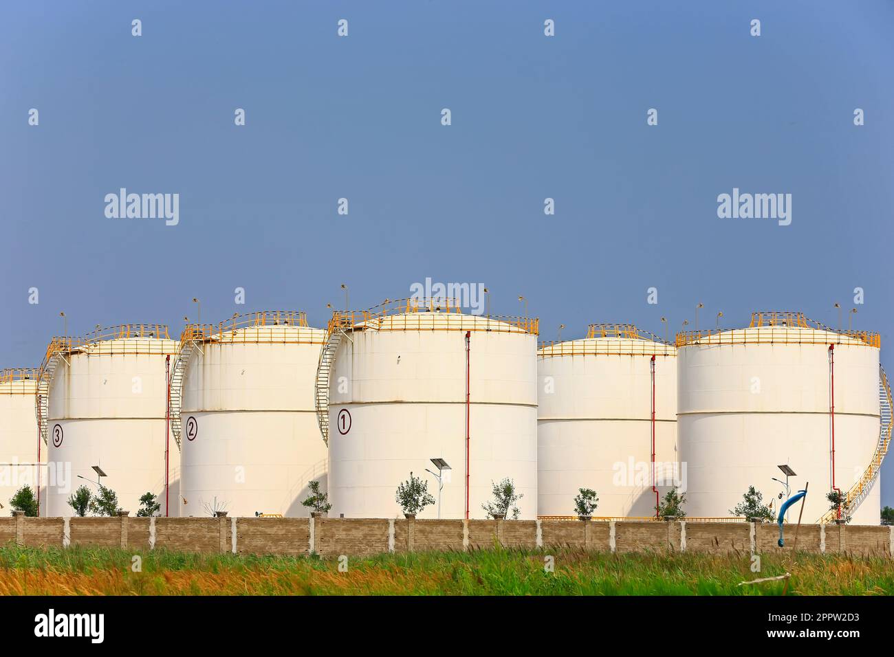 Oil storage tank, industrial equipment Stock Photo - Alamy