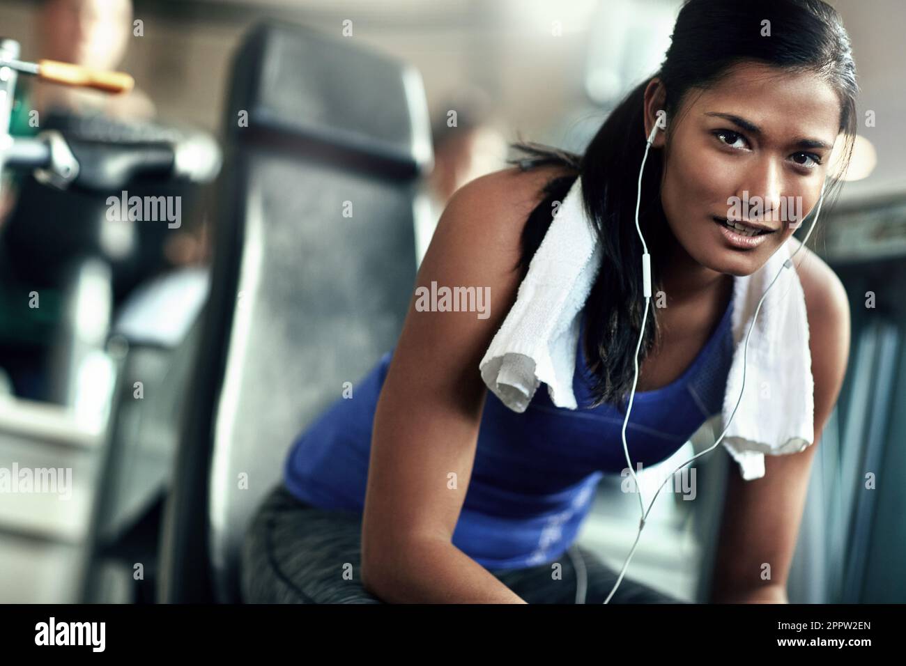 I dont do excuses, I do exercises. a young woman taking a break from ...