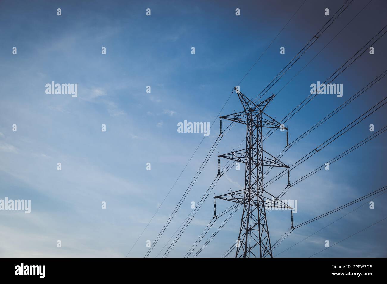 High voltage post tower with blue sky before sunset background Stock ...