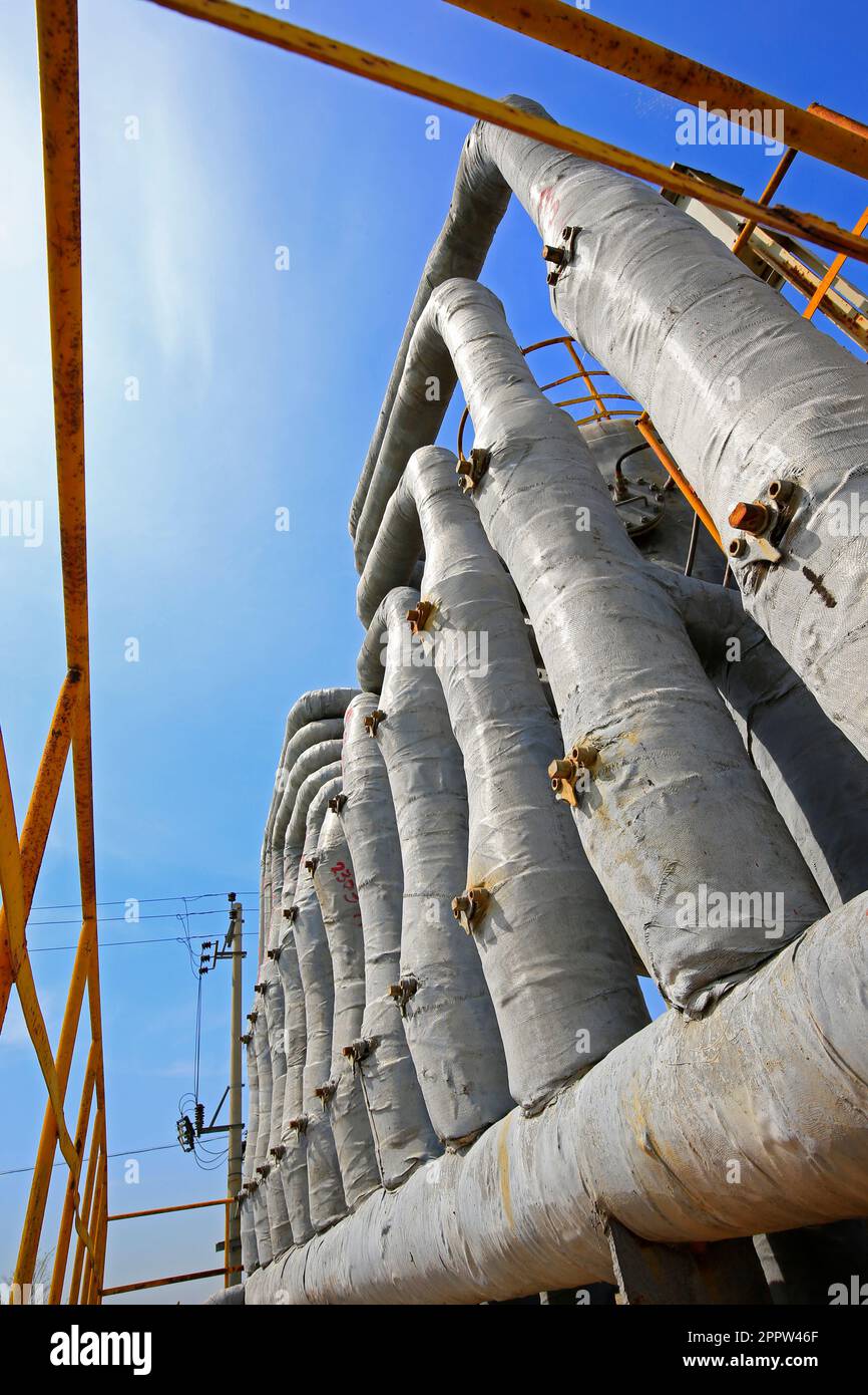 Oil pipes and valves Stock Photo - Alamy