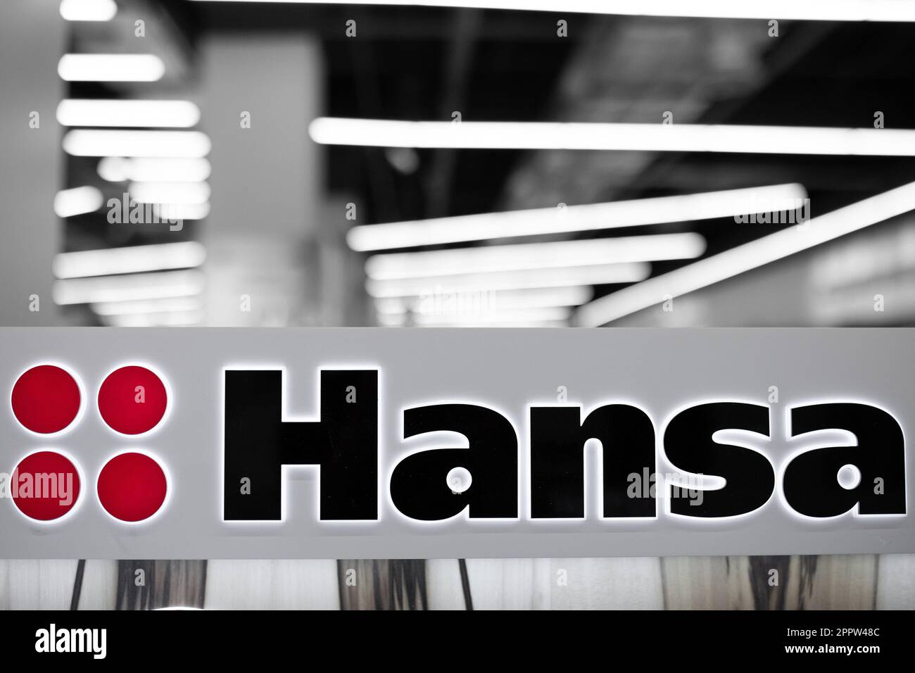 Close-up on the HANSA logo on a decorative wall machines in big store ...