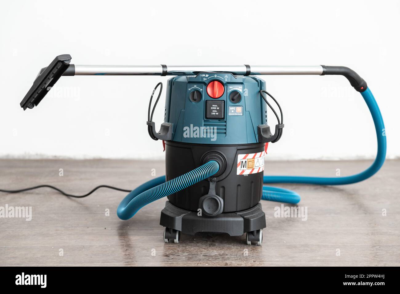 Bosch professional construction vacuum cleaner in an empty room ready ...