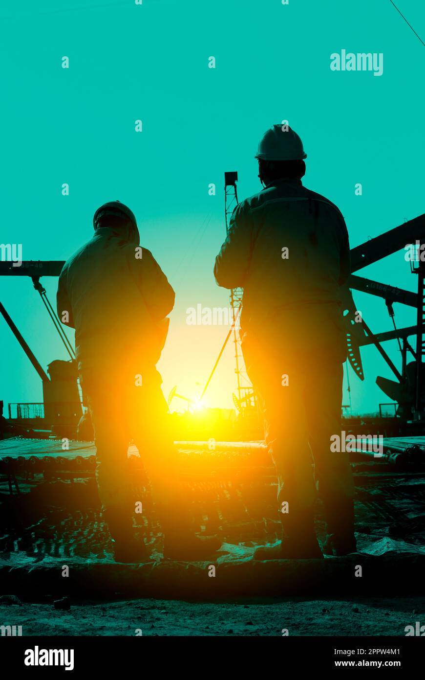 The oil workers at work Stock Photo - Alamy