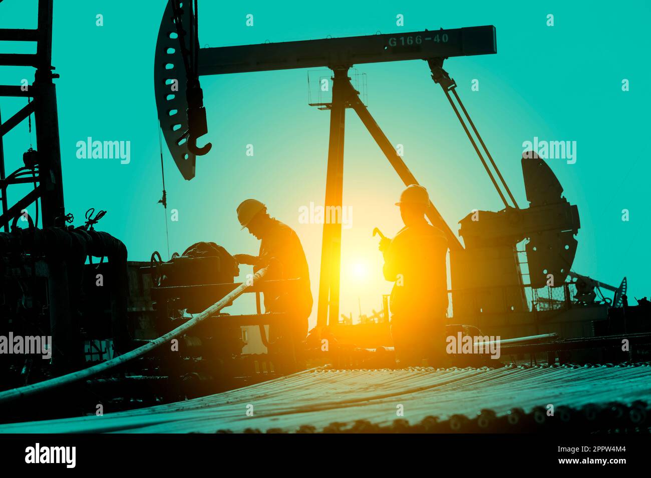 The oil workers at work Stock Photo - Alamy