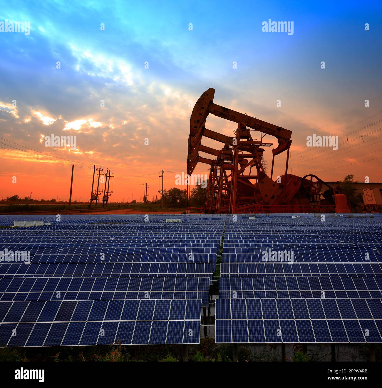 Oil pump with solar panels, industrial equipment Stock Photo - Alamy