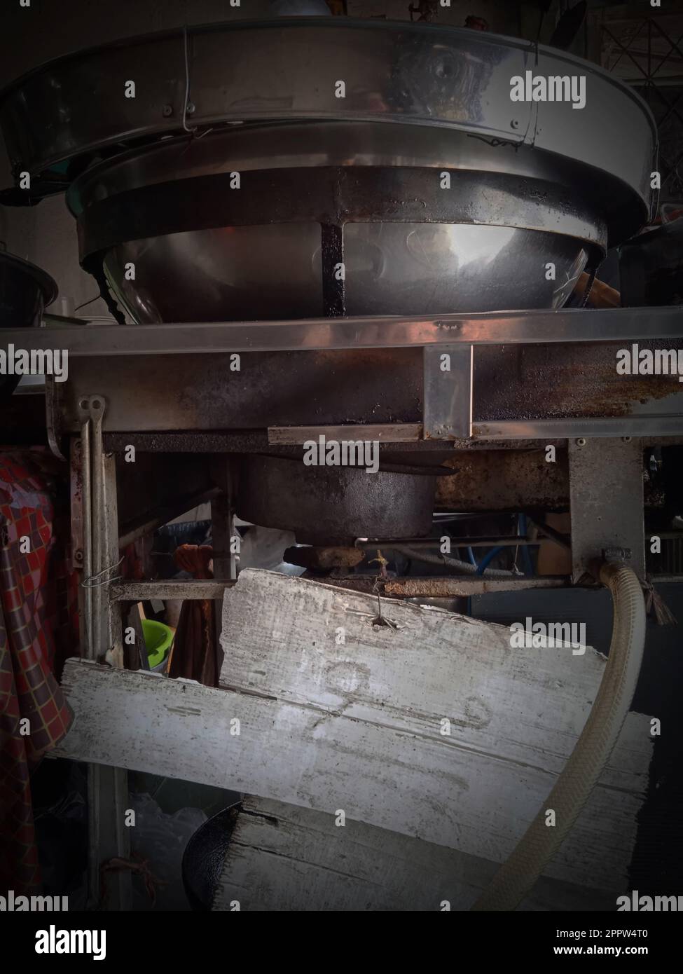 The old rusty pan has been used for a long time Stock Photo - Alamy