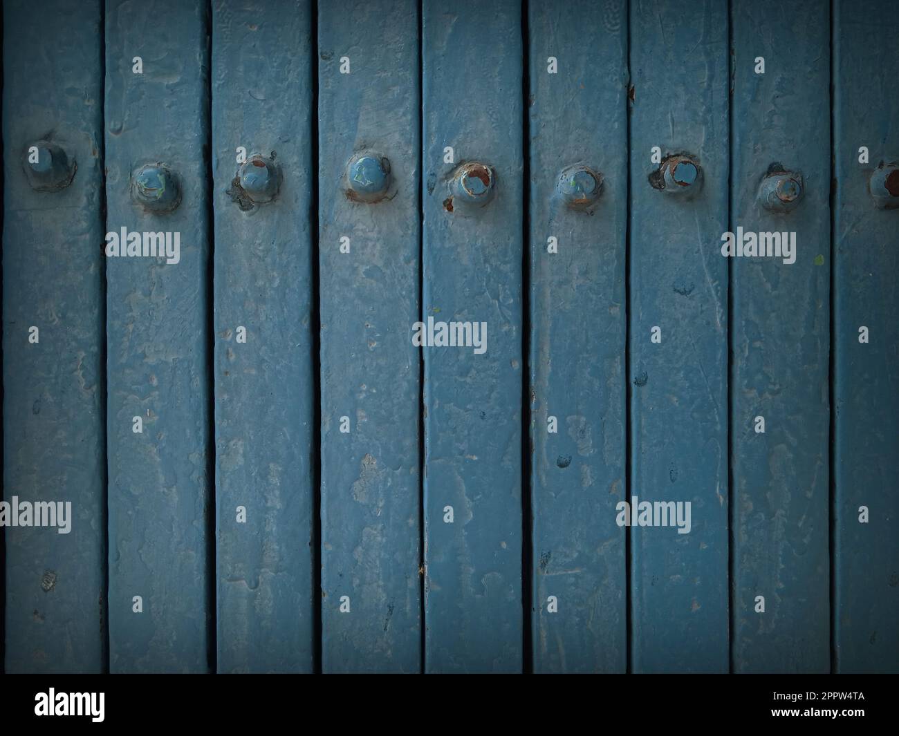 The texture of an old and rusted blue steel plate is used as a design ...