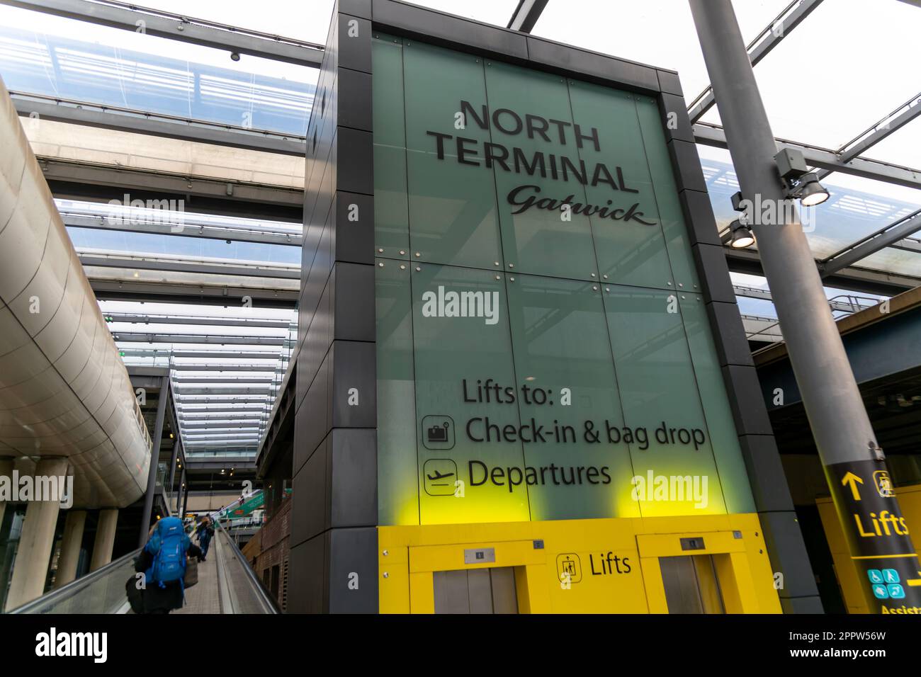 Sign for lifts and walkway at North Terminal, London Gatwick airport ...