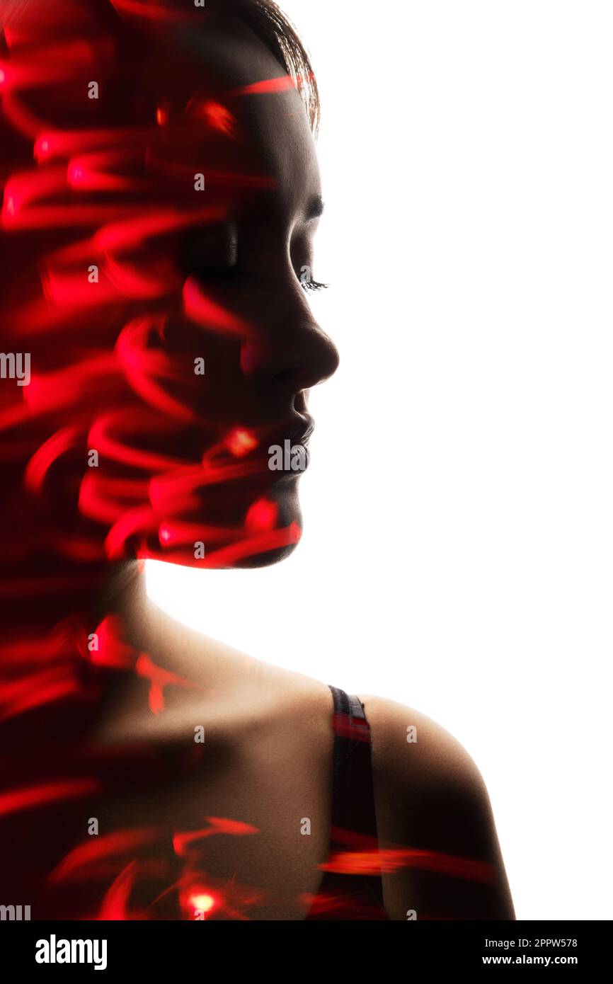 Light therapy art portrait red glowing woman face Stock Photo - Alamy