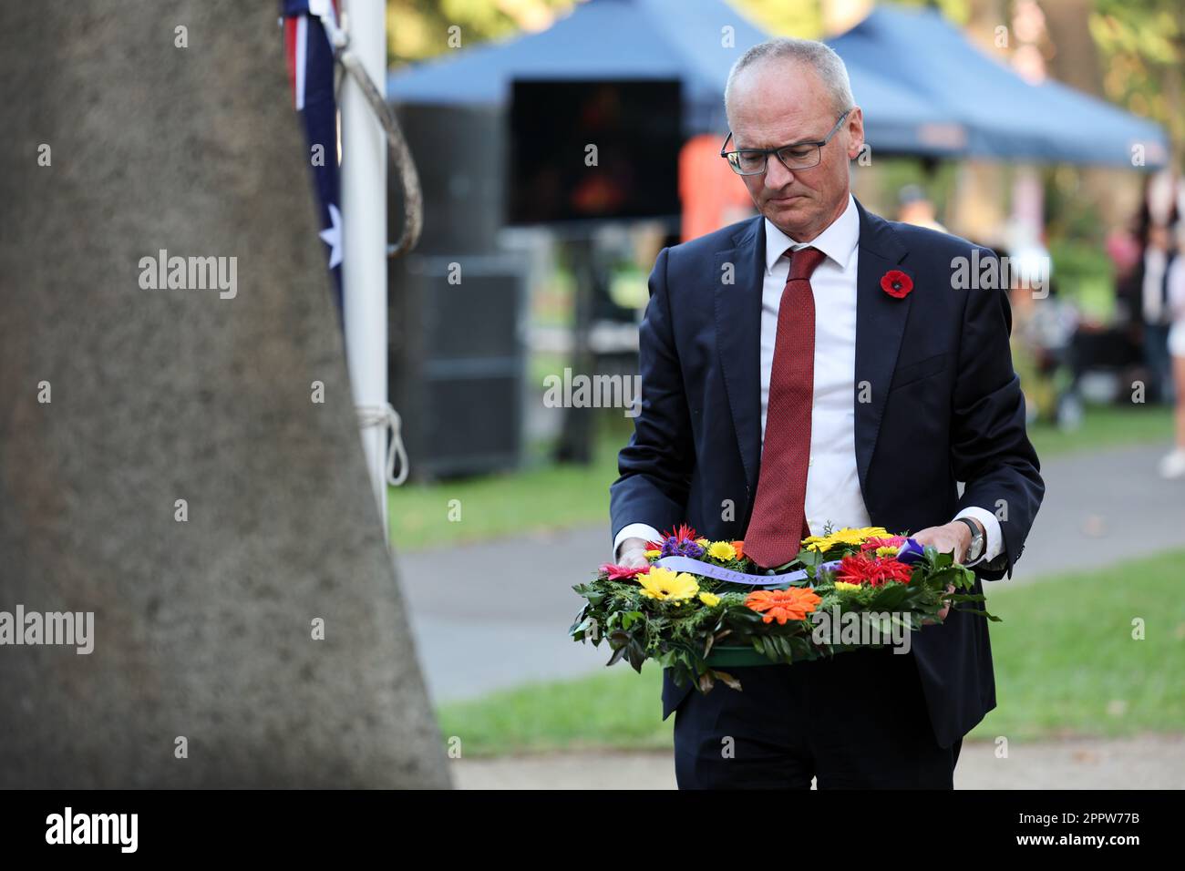 New Zealand Consul-General Bill Dobbie lays a wreath during the ...