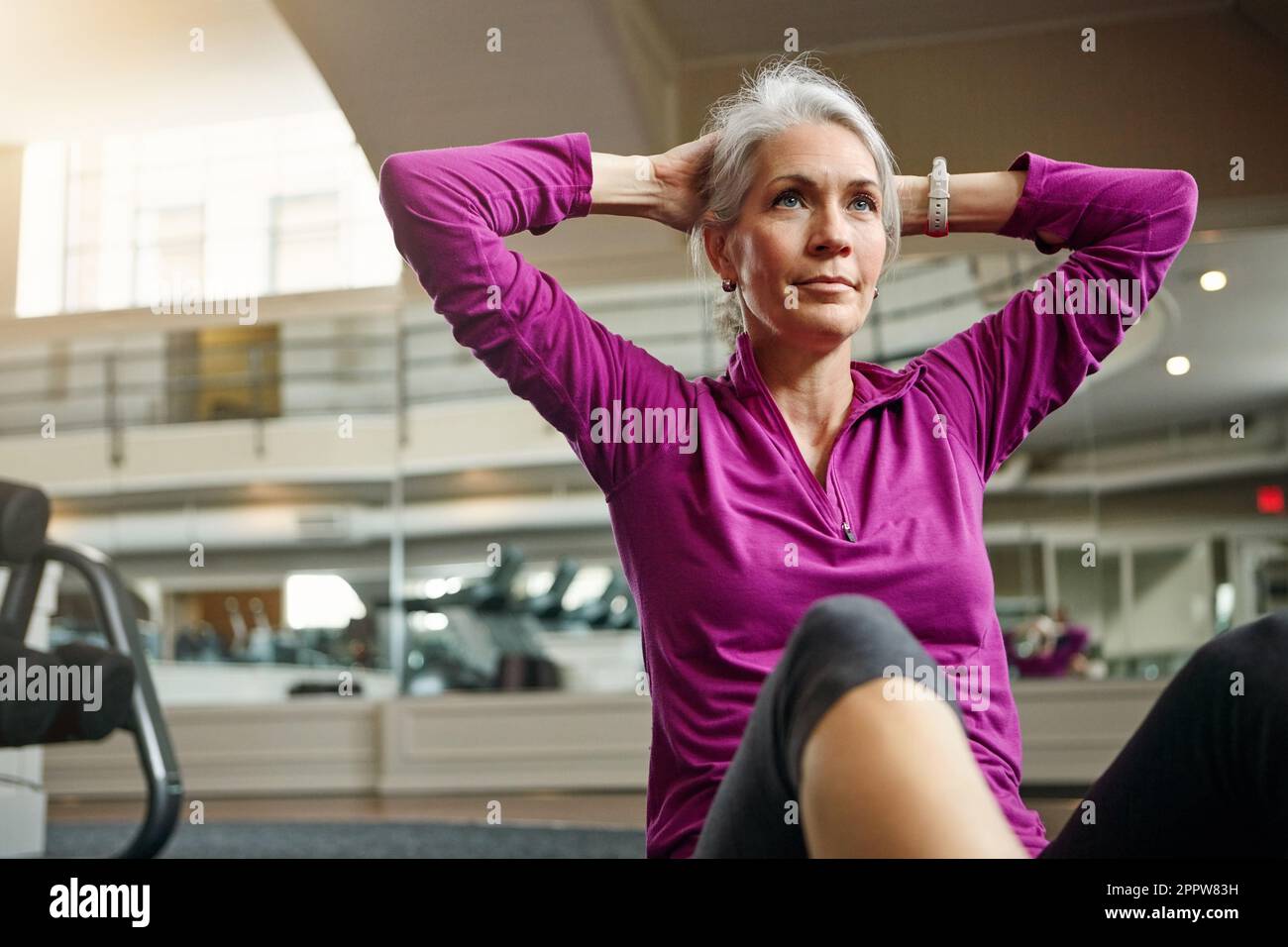 Keeping up with her healthy habits. a mature woman working out at the ...