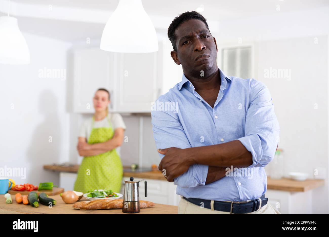 Portrait of frustrated man arguing with his wife Stock Photo - Alamy