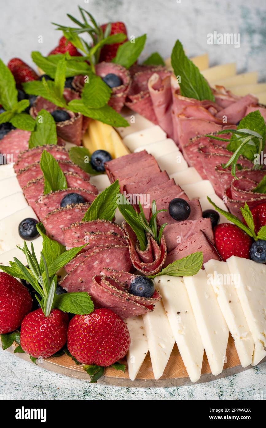Antipasto set plate. Cold smoked meat plate. Antipasto with ham ...