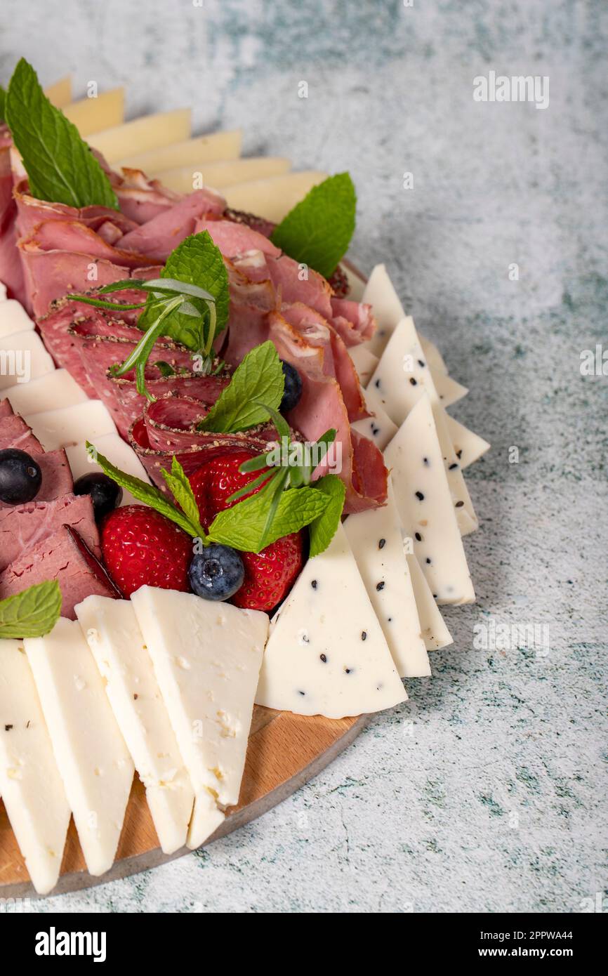 Antipasto set plate. Cold smoked meat plate. Antipasto with ham ...