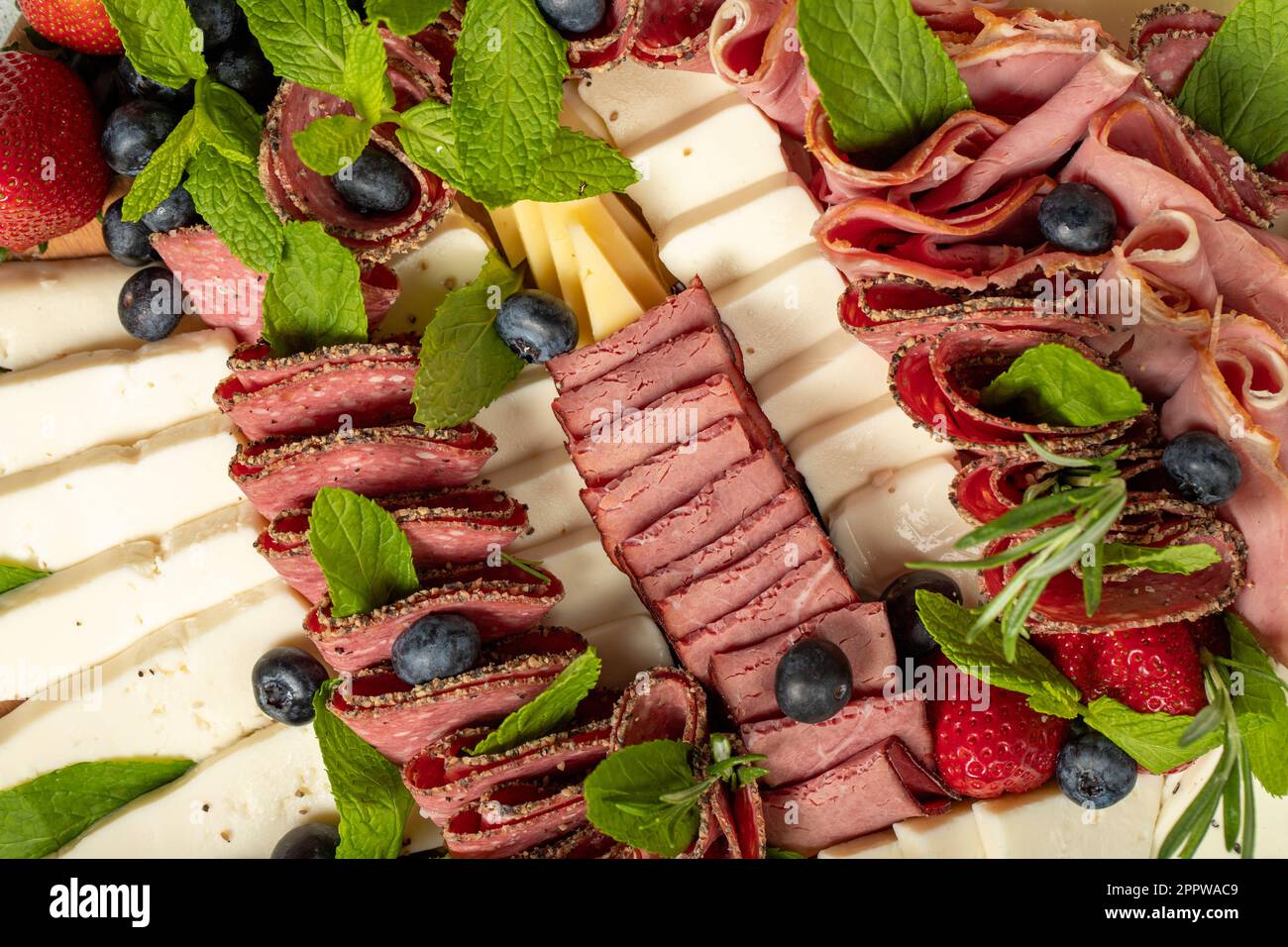 Antipasto set plate. Cold smoked meat plate. Antipasto with ham ...