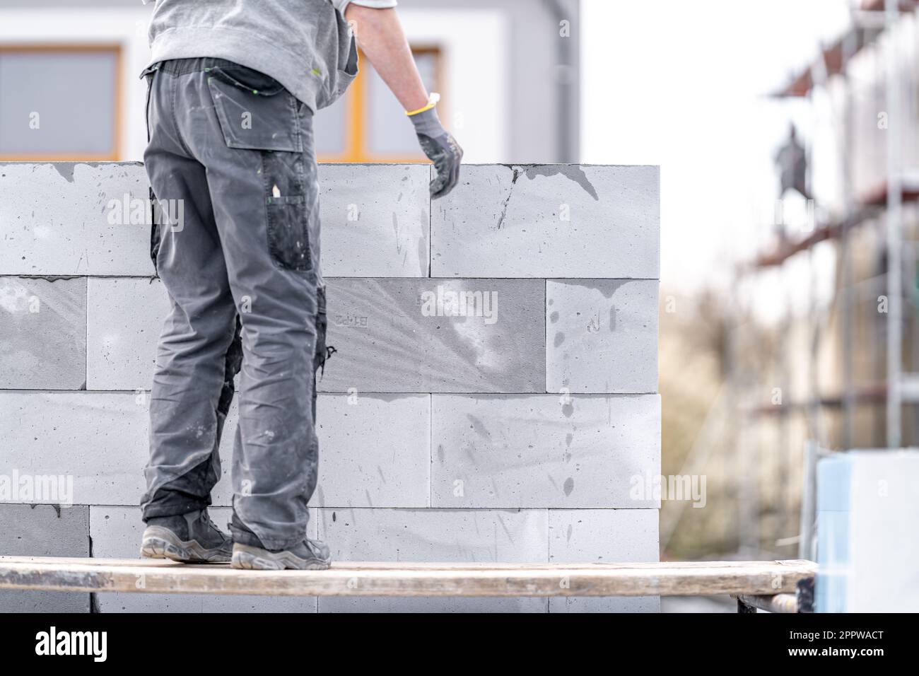 Mason builds wall building hi-res stock photography and images - Alamy
