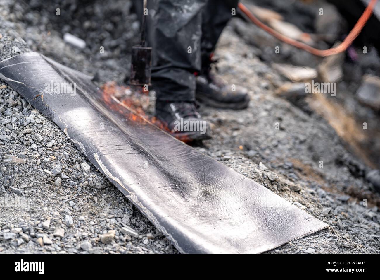 asphalt insulation of buildings. waterproofing, application of help to ...