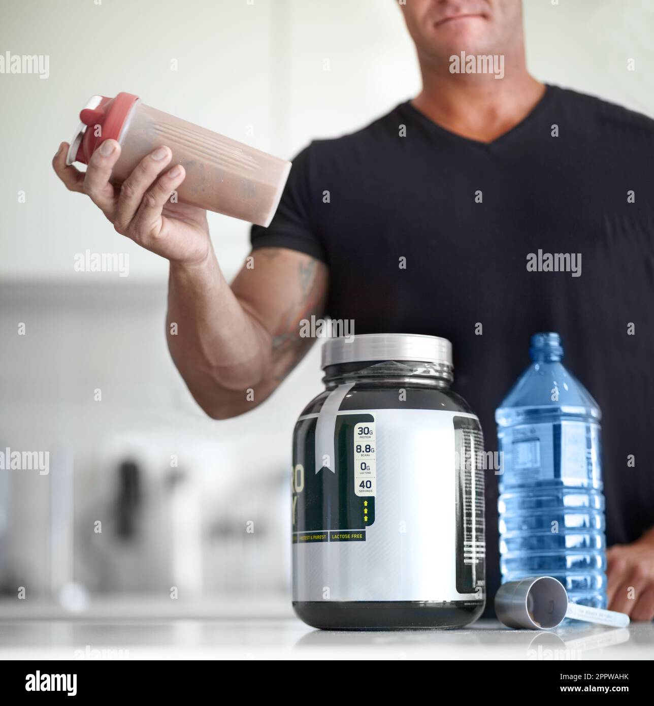 Man, hands and protein shake for nutrition, muscle gain or body mass ...