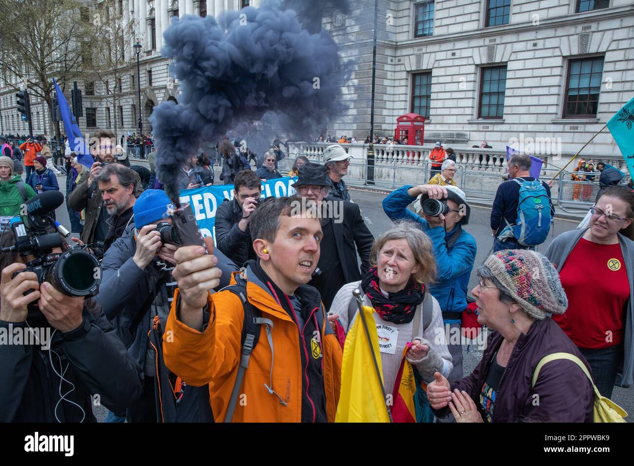 London, UK. 24th April, 2023. Climate activists challenge a fellow ...