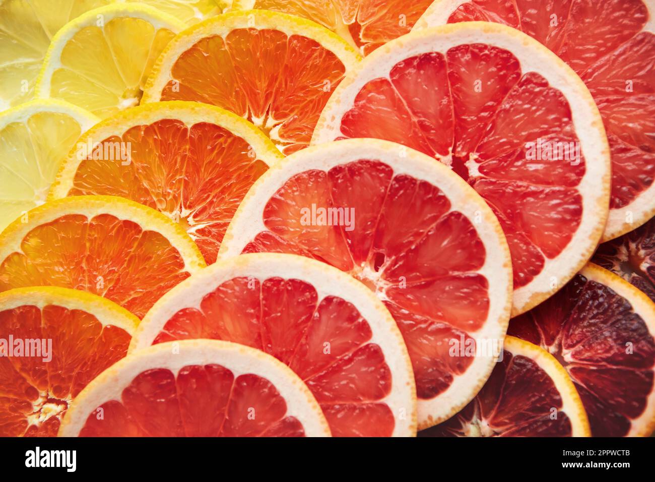 Juicy, fruity goodness. a variety of citrus fruits cut into slices ...
