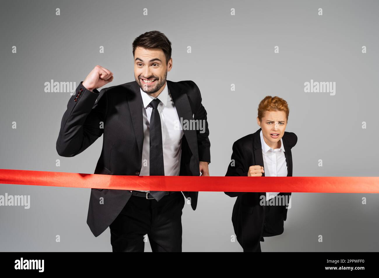 Successful young woman celebrating achievement hi-res stock photography ...