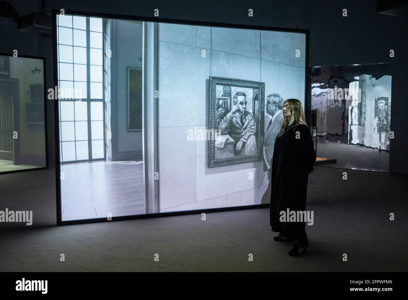 London, UK. 25 April 2023. A staff member with 'Once Again ... (Statues ...