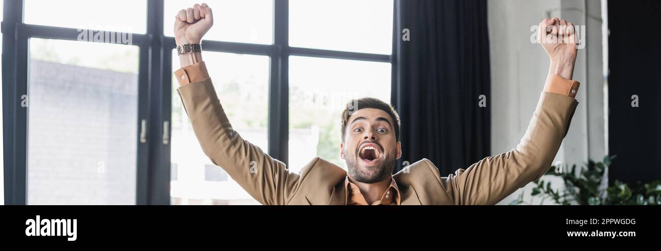Overjoyed business man showing hi-res stock photography and images - Alamy