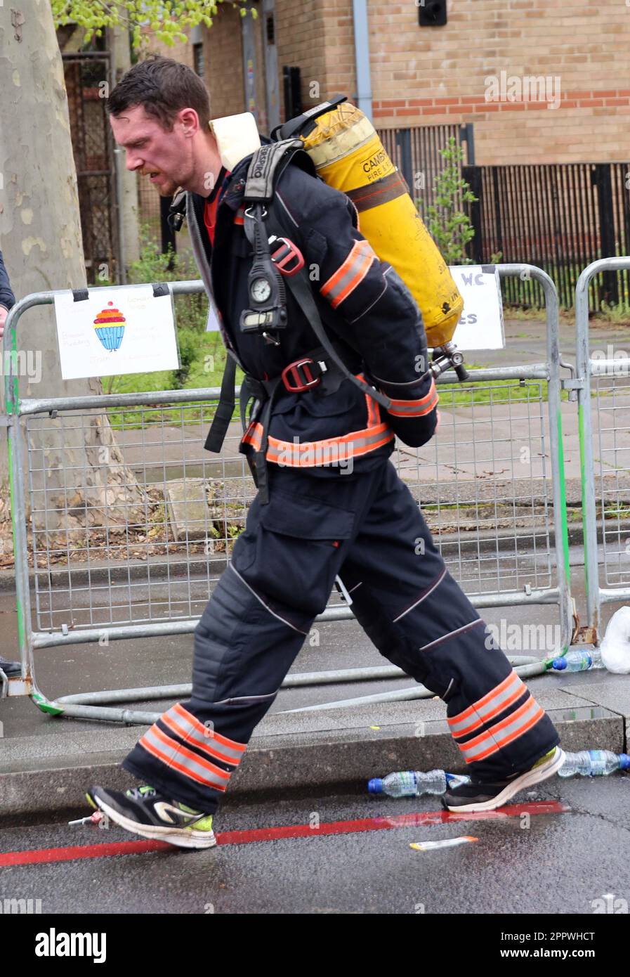 pic shows: London Marathon 2023 Fireman with breathing apparatus ...