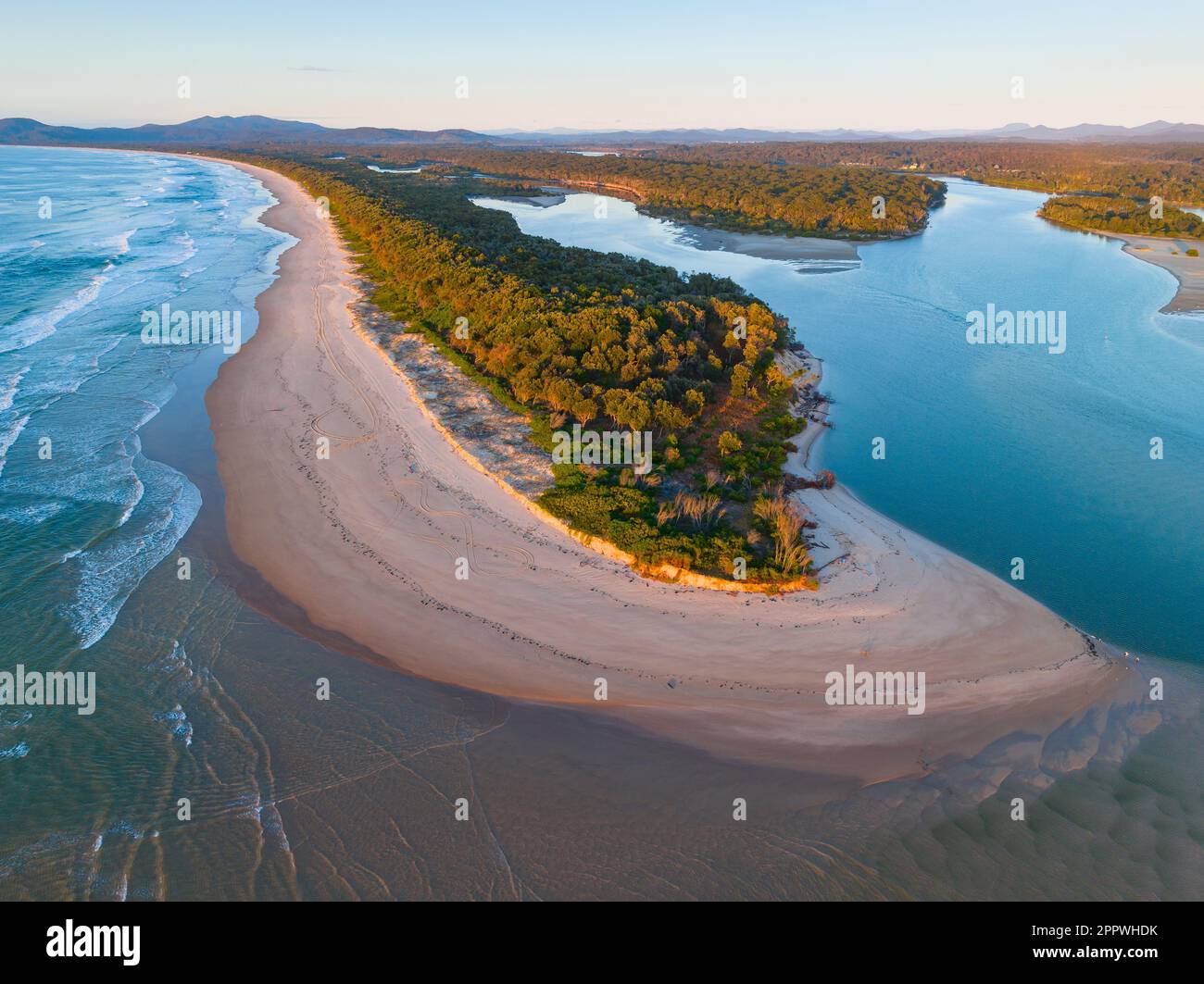 Aerial view of a narrow point surrounded by beaches jutting out into ...