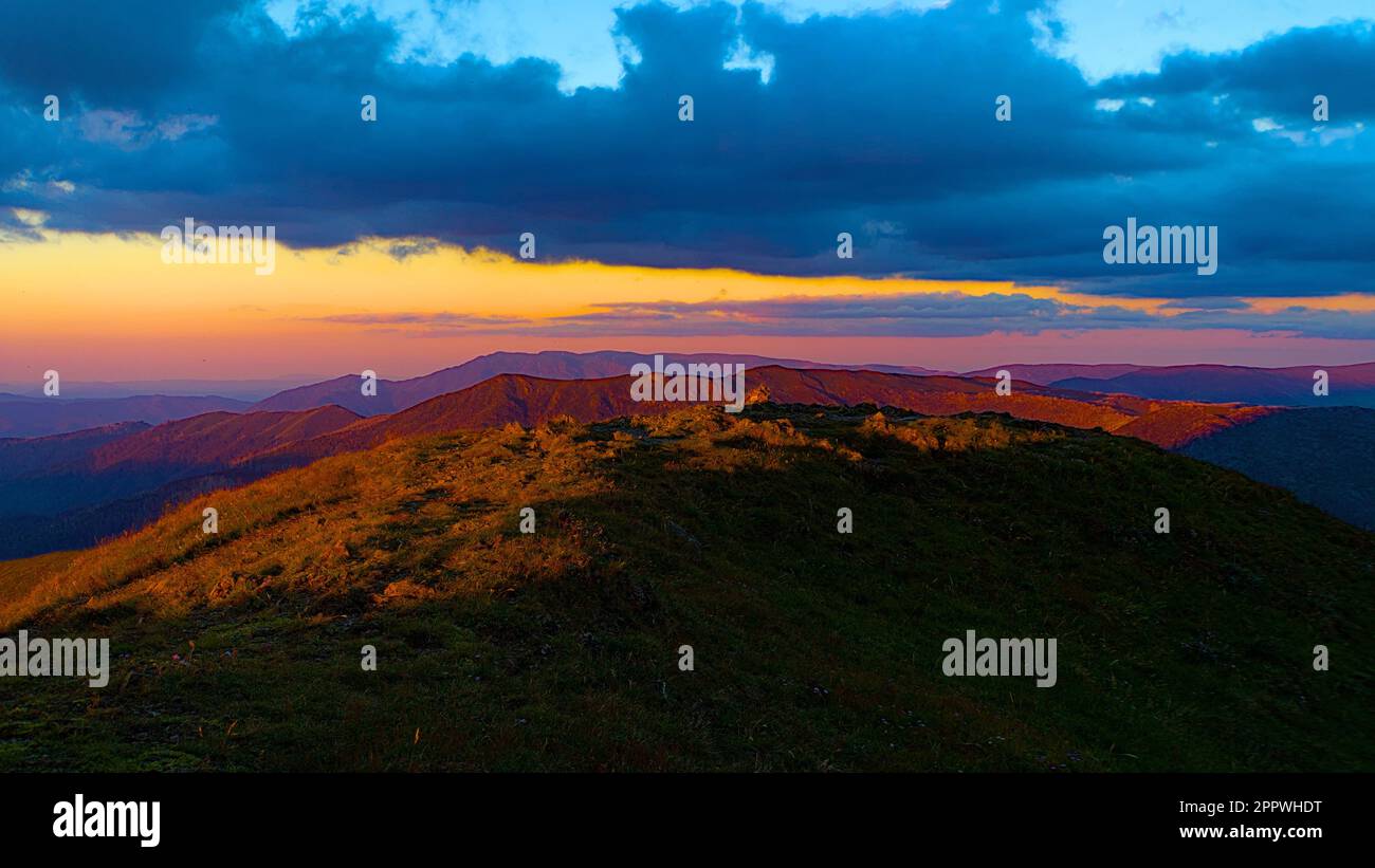 The beautiful Mount Feathertop during vibrant orange sunset in Australia Stock Photo - Alamy